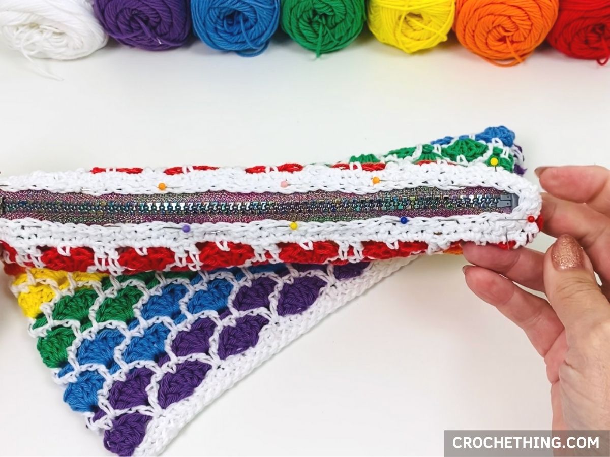 How to sew a zipper to your crochet project - Crochething with Alice